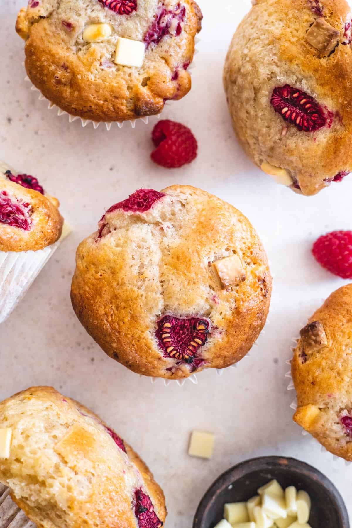 Eggless White Chocolate and Raspberry Muffins - The Classy Baker